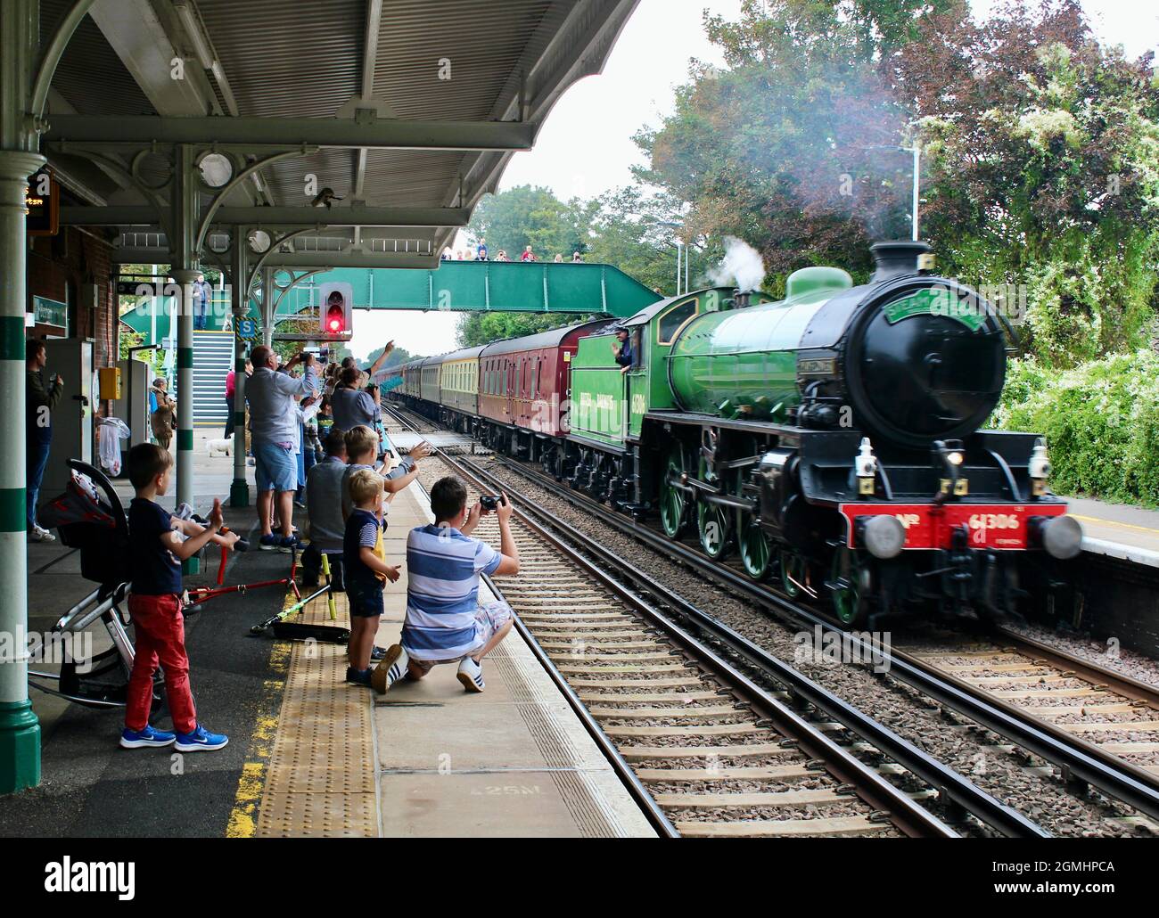 The Mayflower steam train passing through Bosham railway station in ...