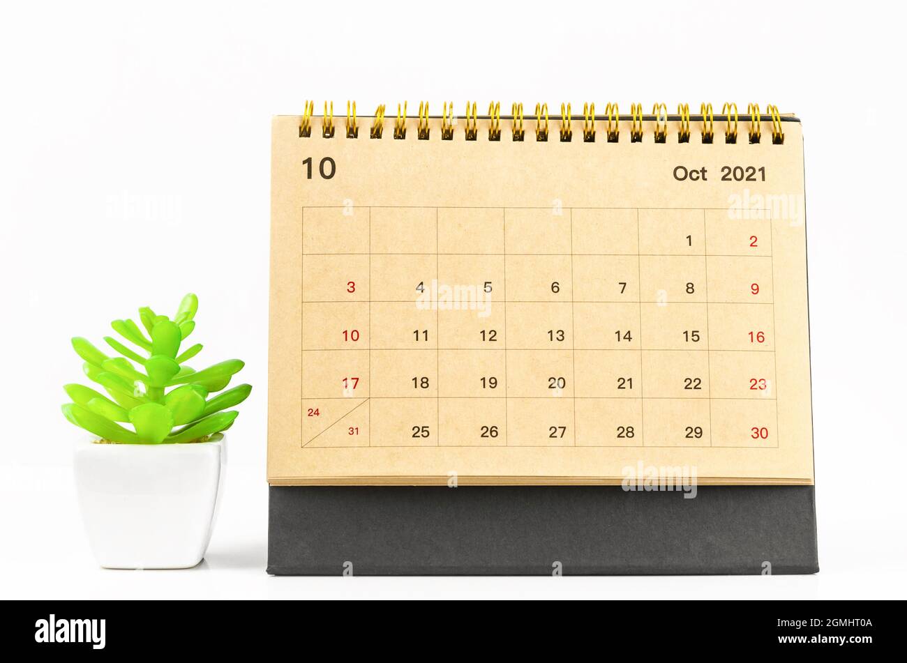 October 2021 Desk calendar with plant pot on white background Stock ...