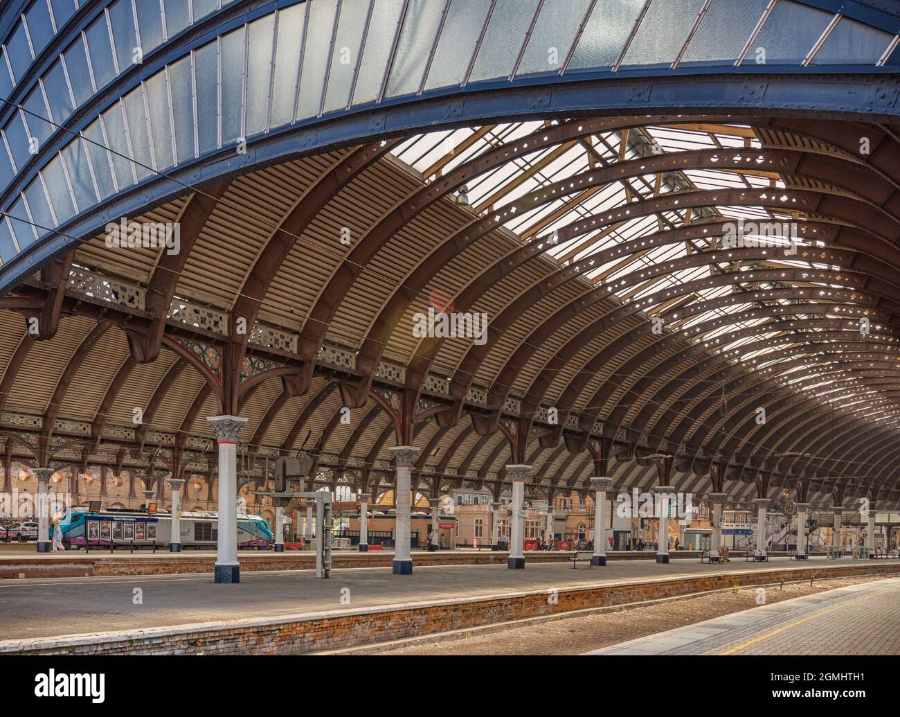 A panorama of a railway station concourse. An 18th century iron canopy ...