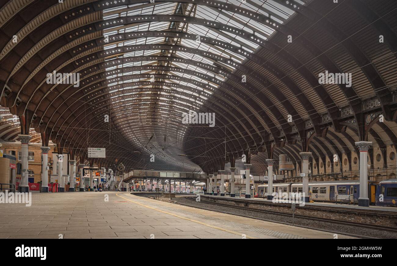 A panorama of a railway station concourse. An 18th century iron canopy ...