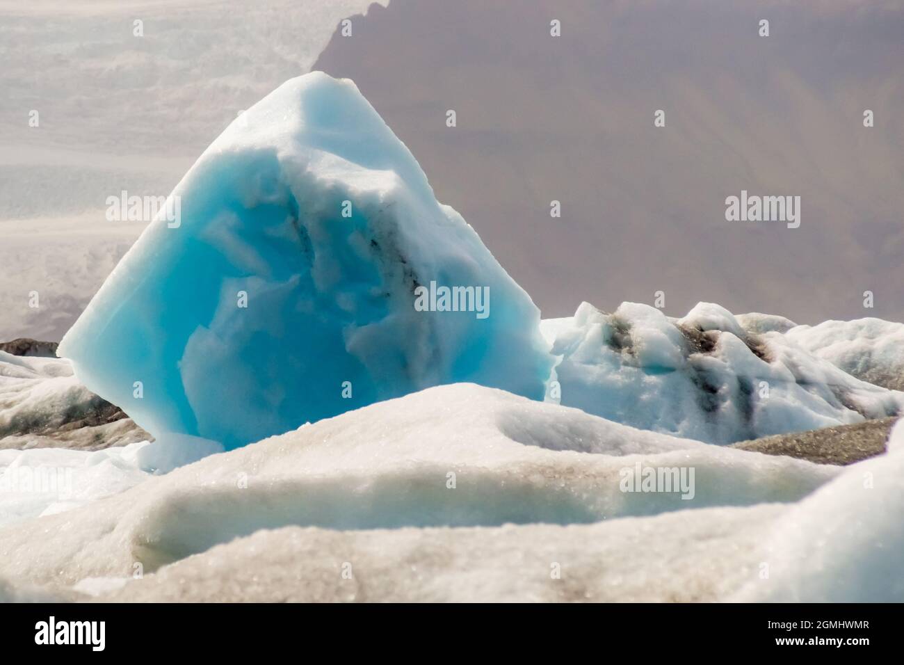 A blue-colored iceberg at Iceland's famous Joekulsarlon Bay Stock Photo ...