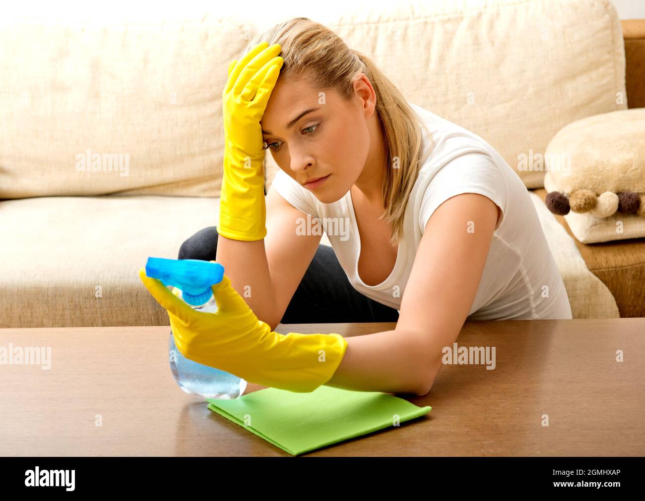 Tired unhappy cleaning lady sitting hi-res stock photography and images ...