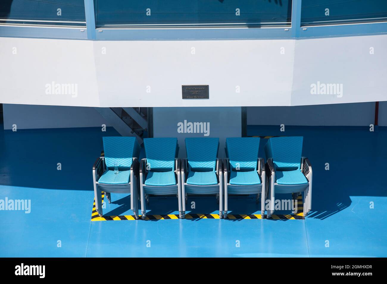 stacked chairs on a ship of the cruise company Koeln-Duesseldorfer ...