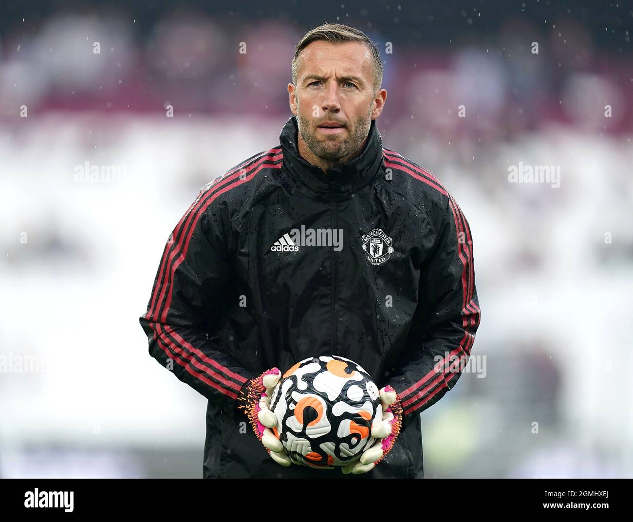 Manchester United goalkeeper coach Craig Mawson warming up prior to ...