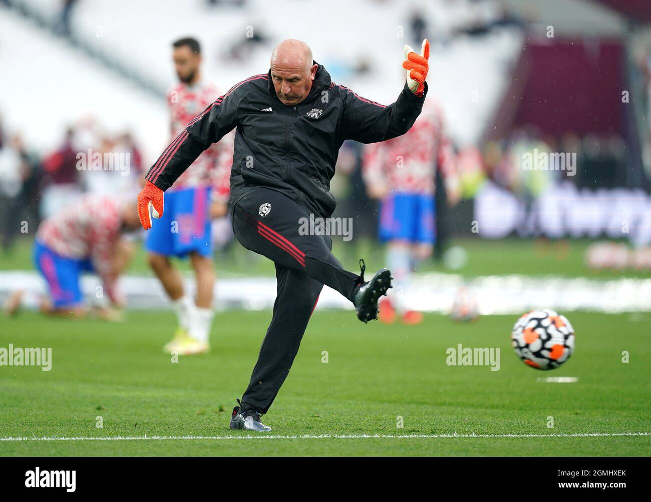Manchester United goalkeeper coach Richard Hartis warming up prior to ...