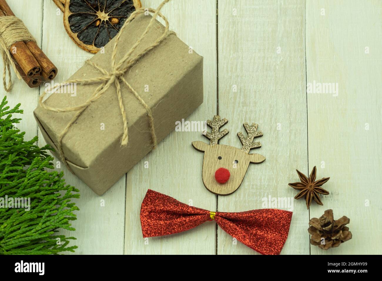 A Christmas gift wrapped in eco paper. Eco-friendly gift wrapping in ...