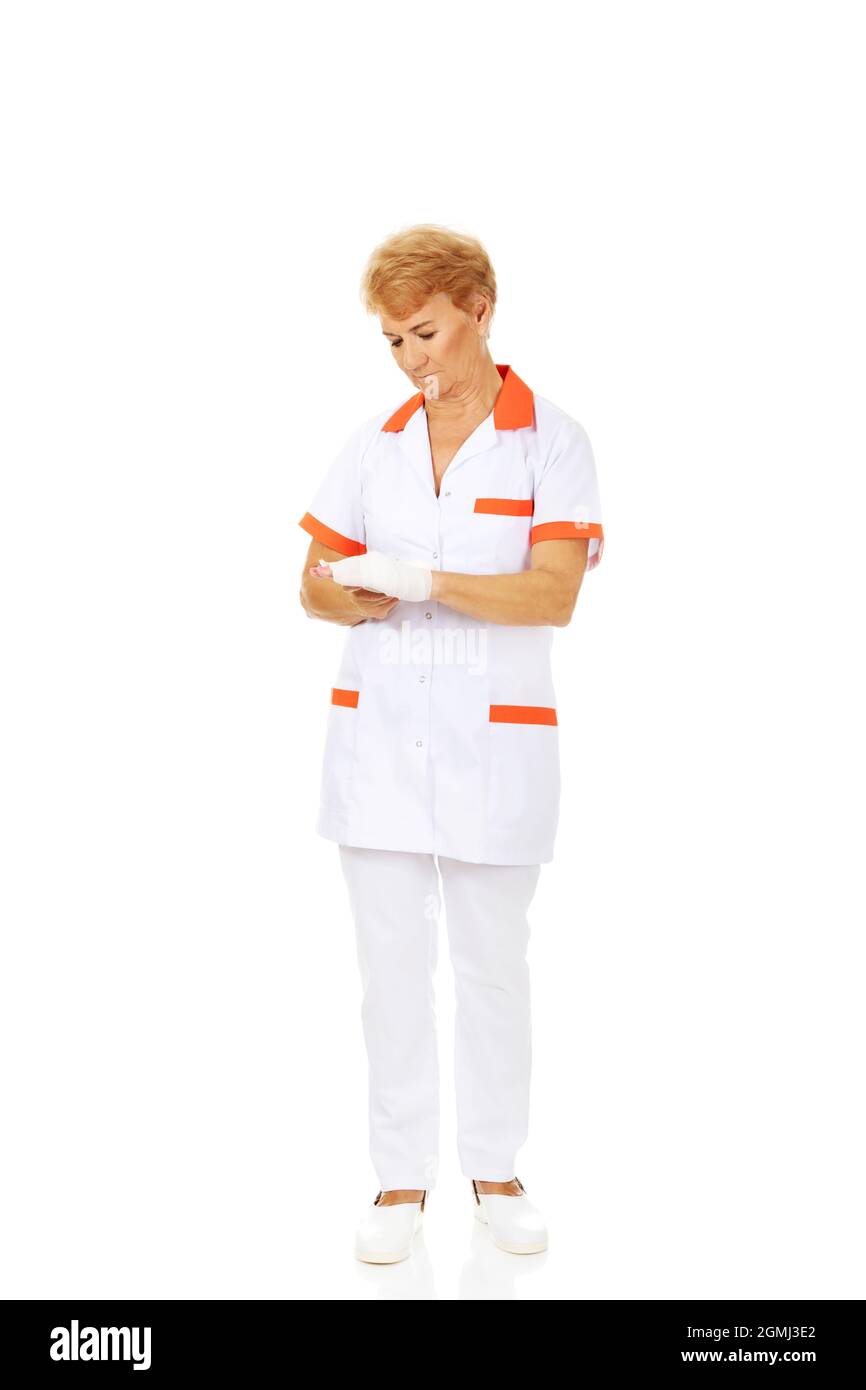 Portrait senior doctor wearing Cut Out Stock Images & Pictures - Alamy