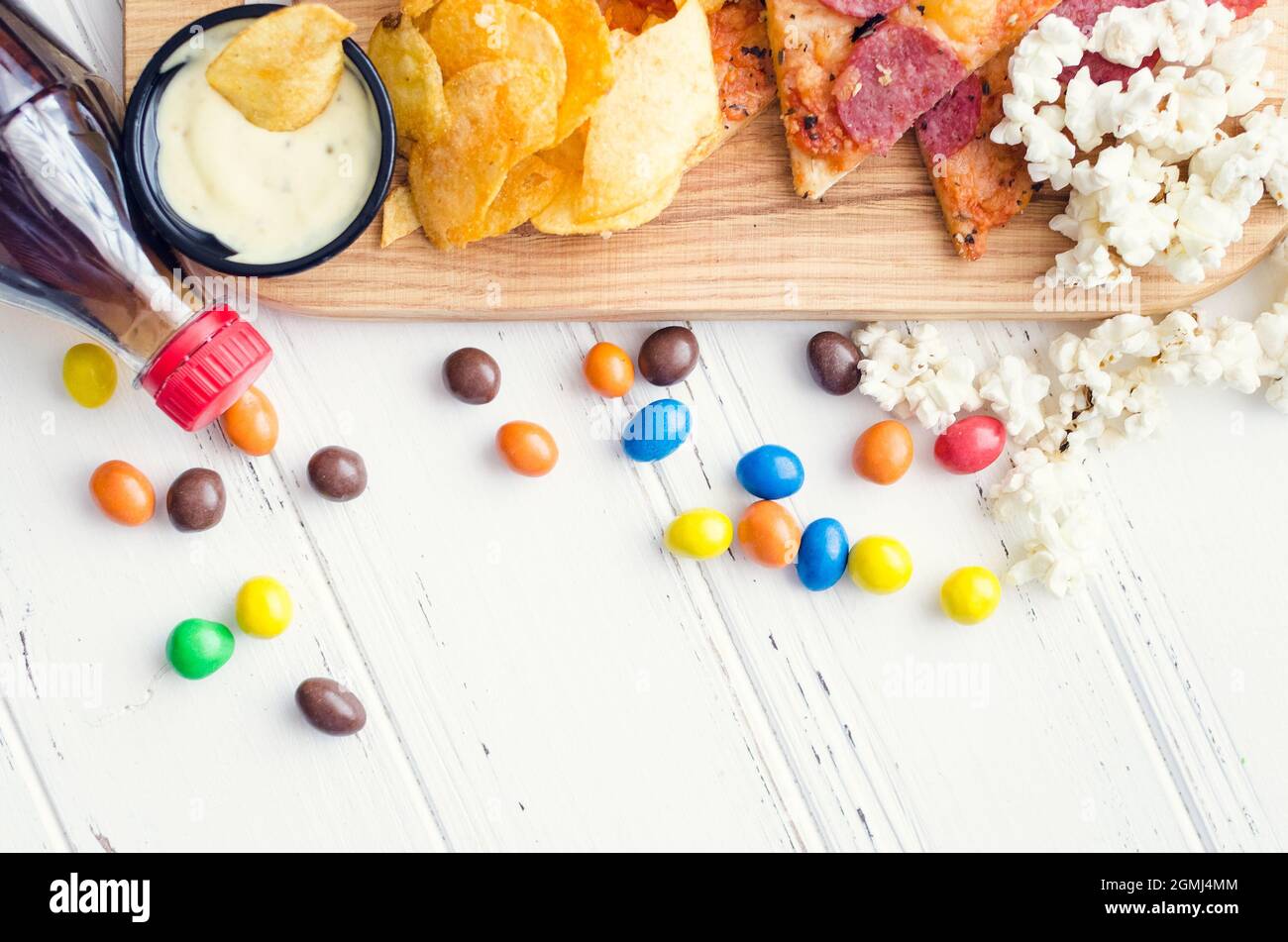 Fast food and unhealthy eating concept. Close up of fastfood snacks ...