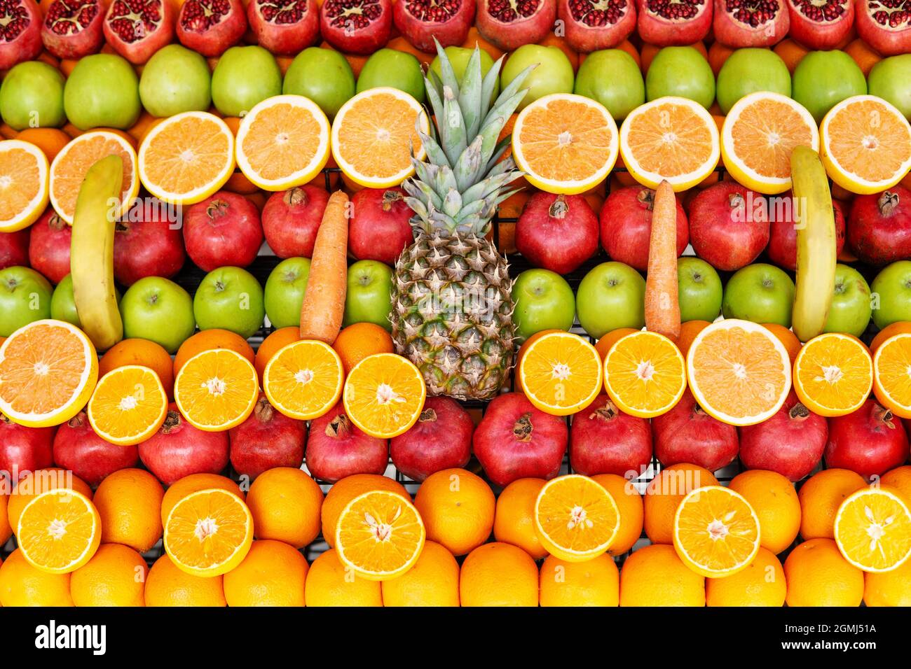Market counter with assorted fruits and vegetables. Vivid fruit ...