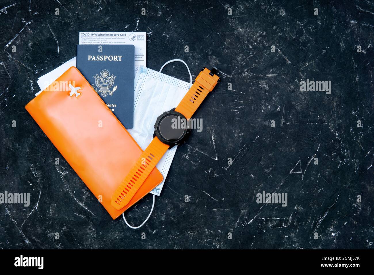 US passport with a Covid-19 vaccination record card, face mask ...