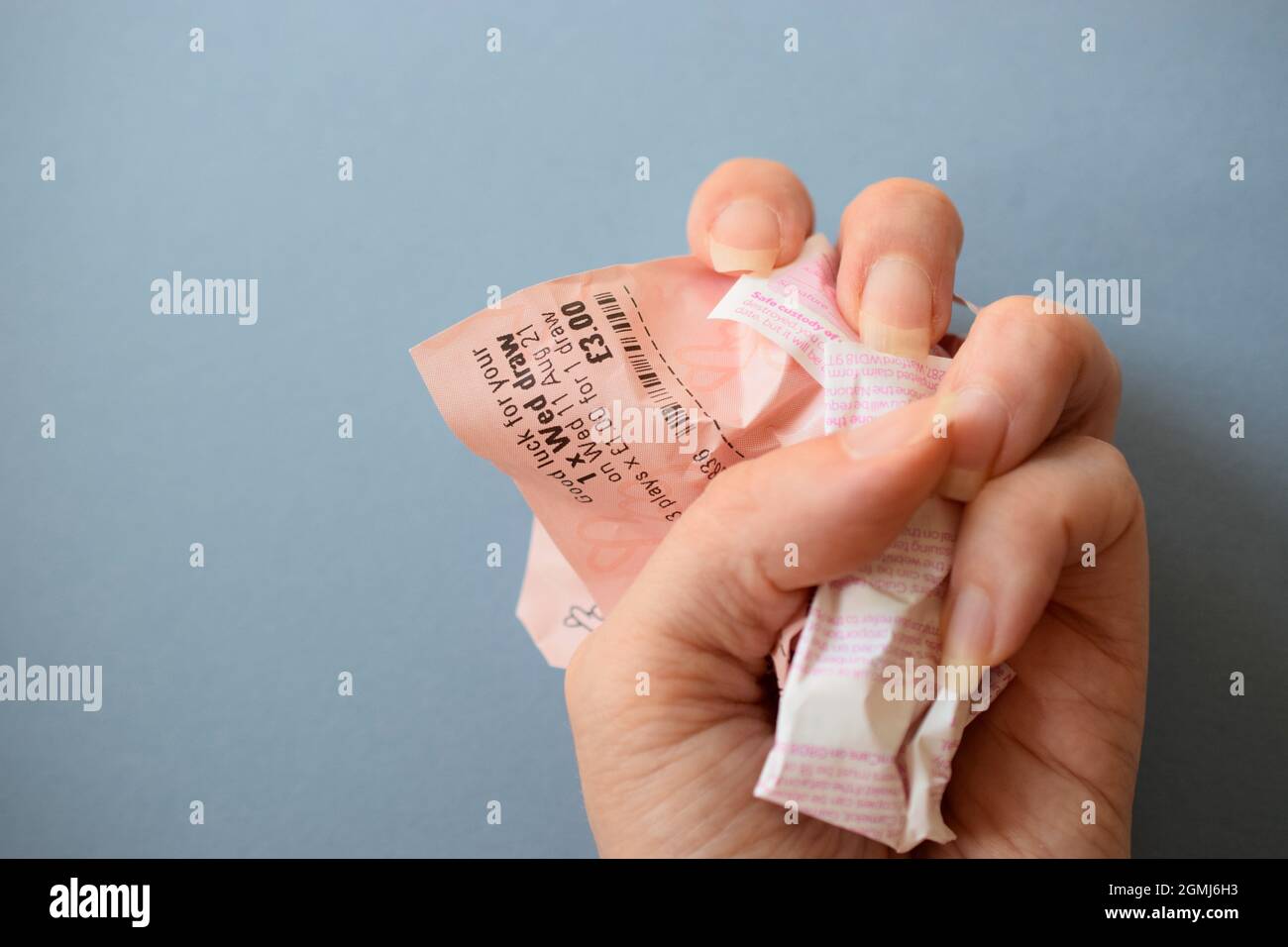 Uk lottery ticket hand hi-res stock photography and images - Alamy