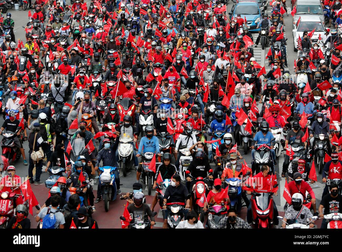 Protesters ride their motorcycles and drive vehicles during a car mob ...