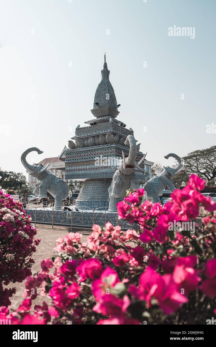 Large stone monument with elephants in the park in Vientiane in Laos ...