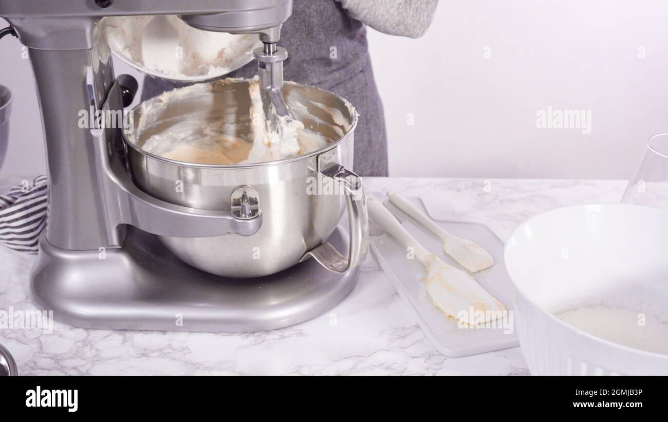 Mixing ingredients making funfetti cake hi-res stock photography and ...
