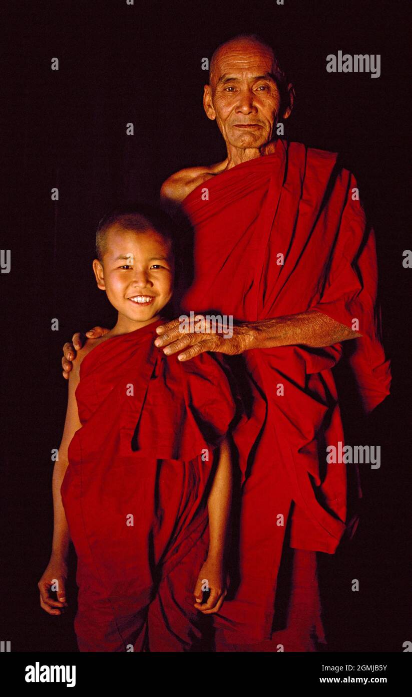 Myanmar. Portrait of Buddhist monk and child novice Stock Photo - Alamy