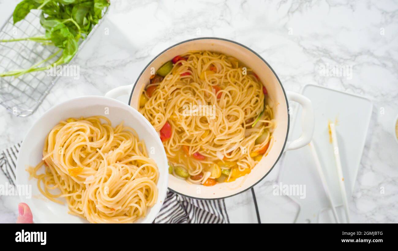 Flat lay. Step by step. Serving a one-pot pasta into a white pasta ...