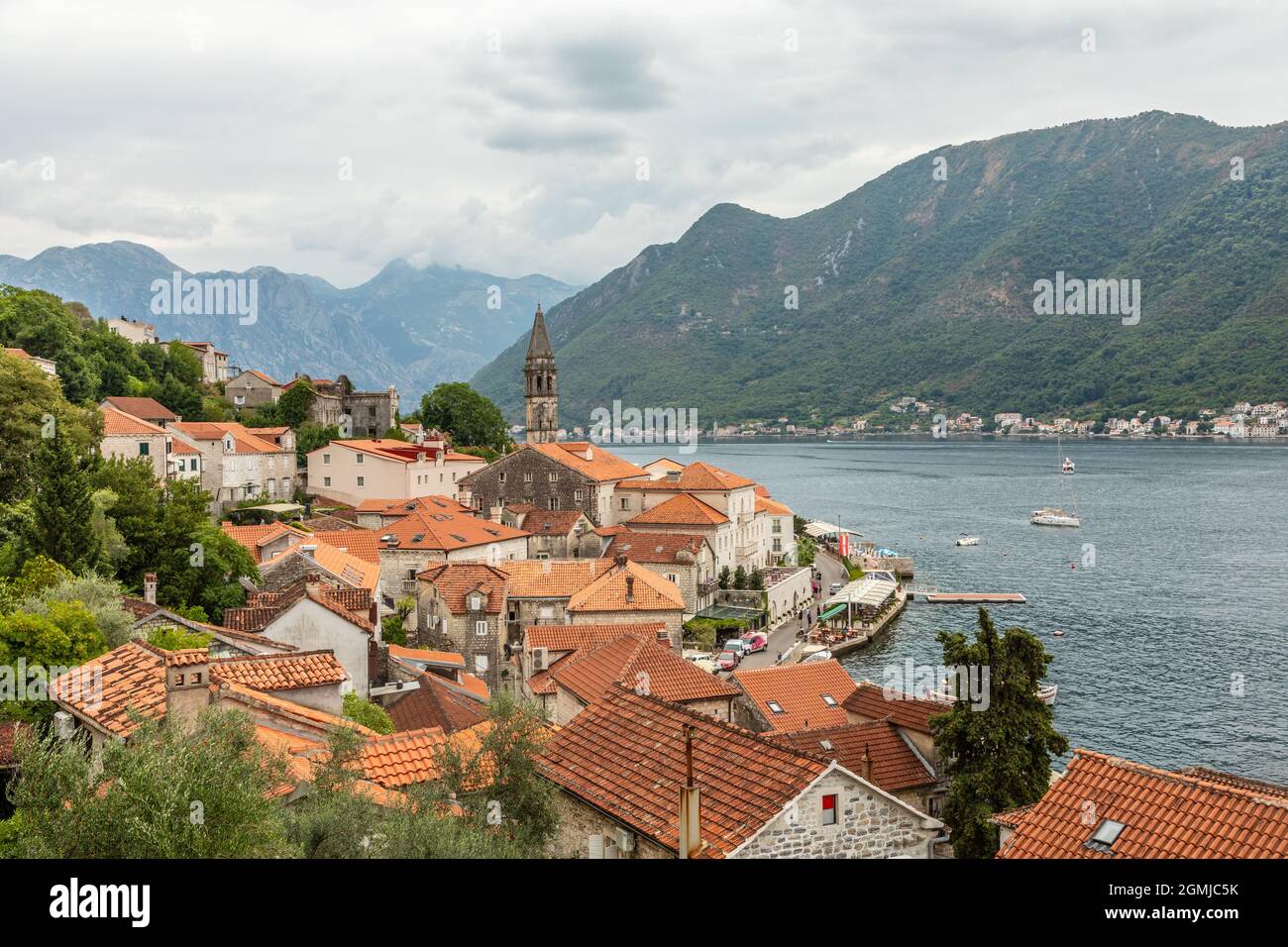 Panorama of medieval town Perast with orange tiled houses, Kotor Bay ...