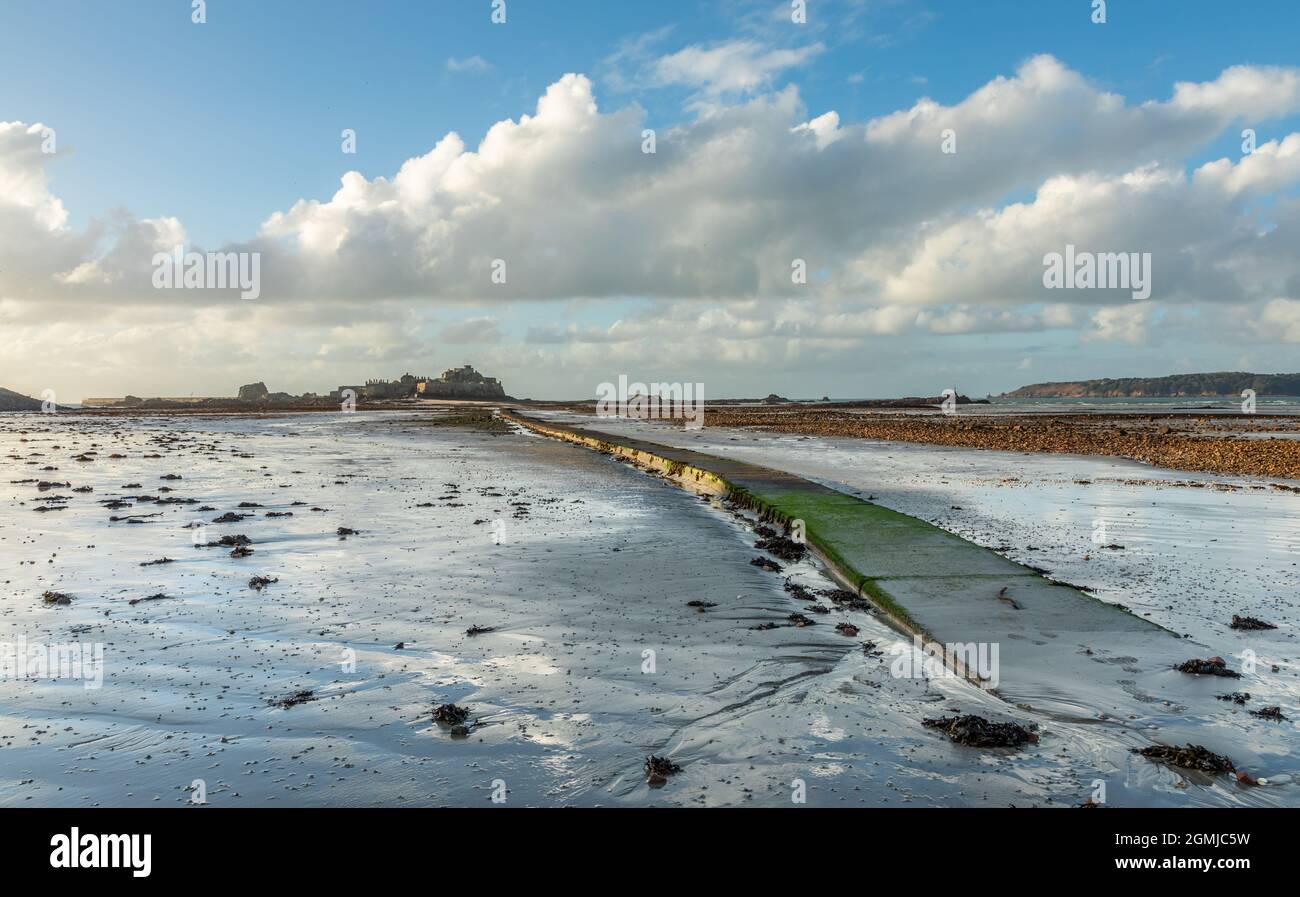 Road on the sea bottom with Elizabeth Castle in a background, Saint ...