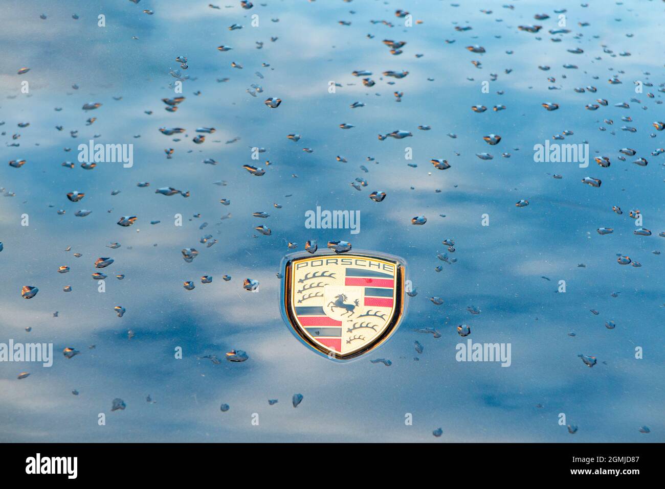 Porsche badge on the bonnet of 911 with droplets of rain water Stock ...