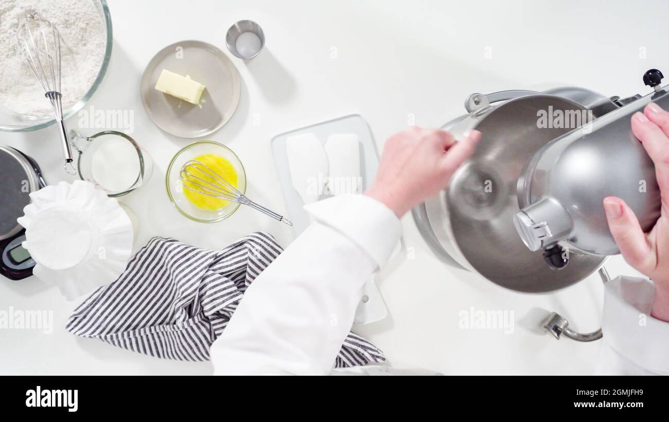 Flat lay. Mixing ingredients in a kitchen standing mixer to bake ...