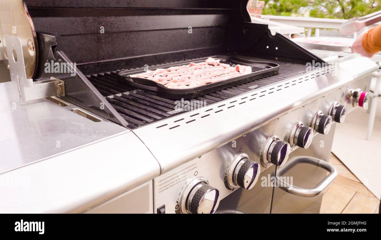 Cooking bacon stips on hi-res stock photography and images - Alamy