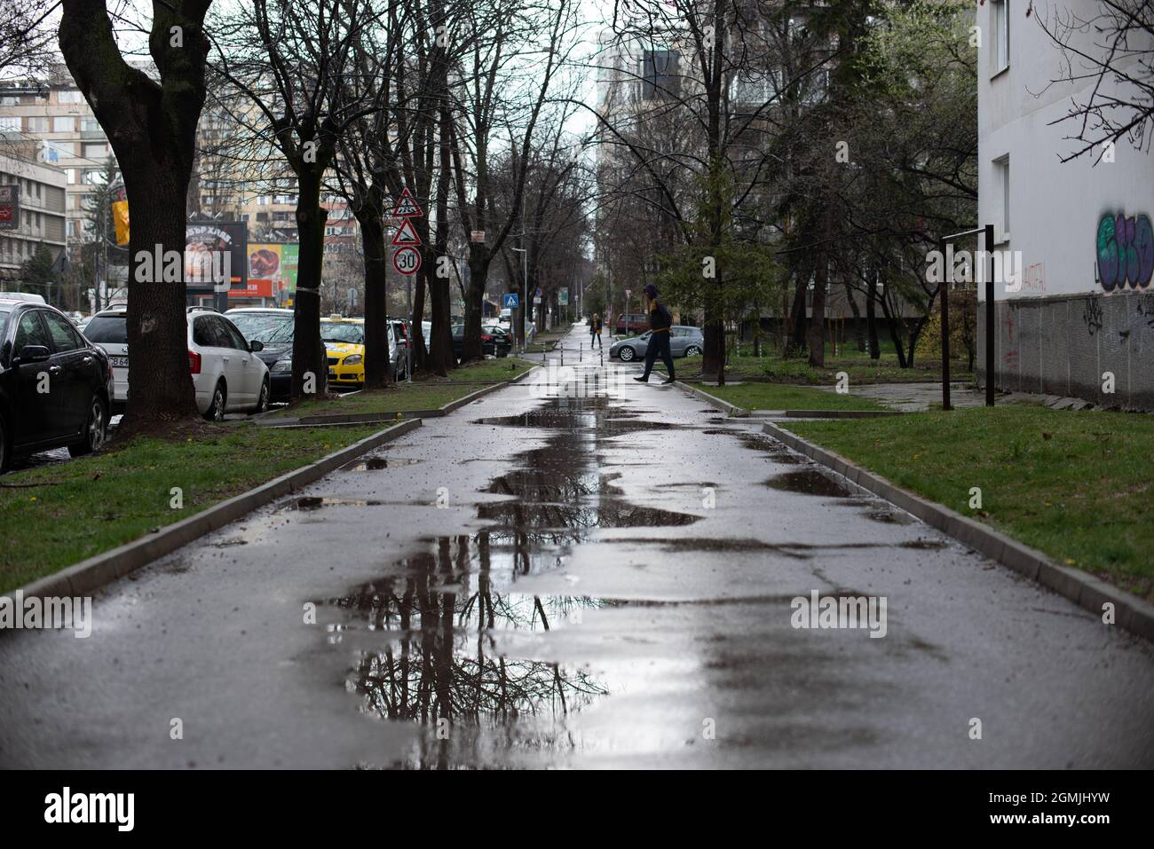 People walking in the rain, Sofia Bulgaria, Hipodruma, bad weather ...