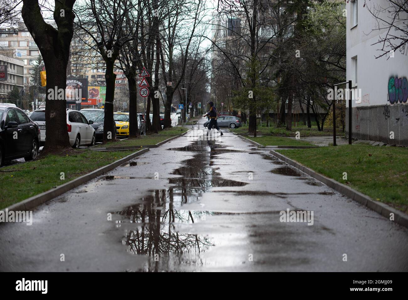 People walking in the rain, Sofia Bulgaria, Hipodruma, bad weather ...