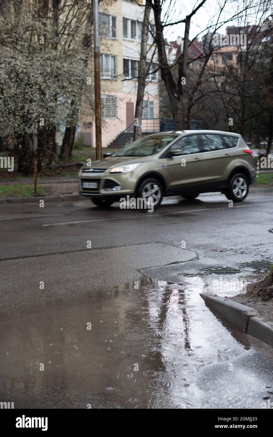 Driving in puddles hi-res stock photography and images - Alamy