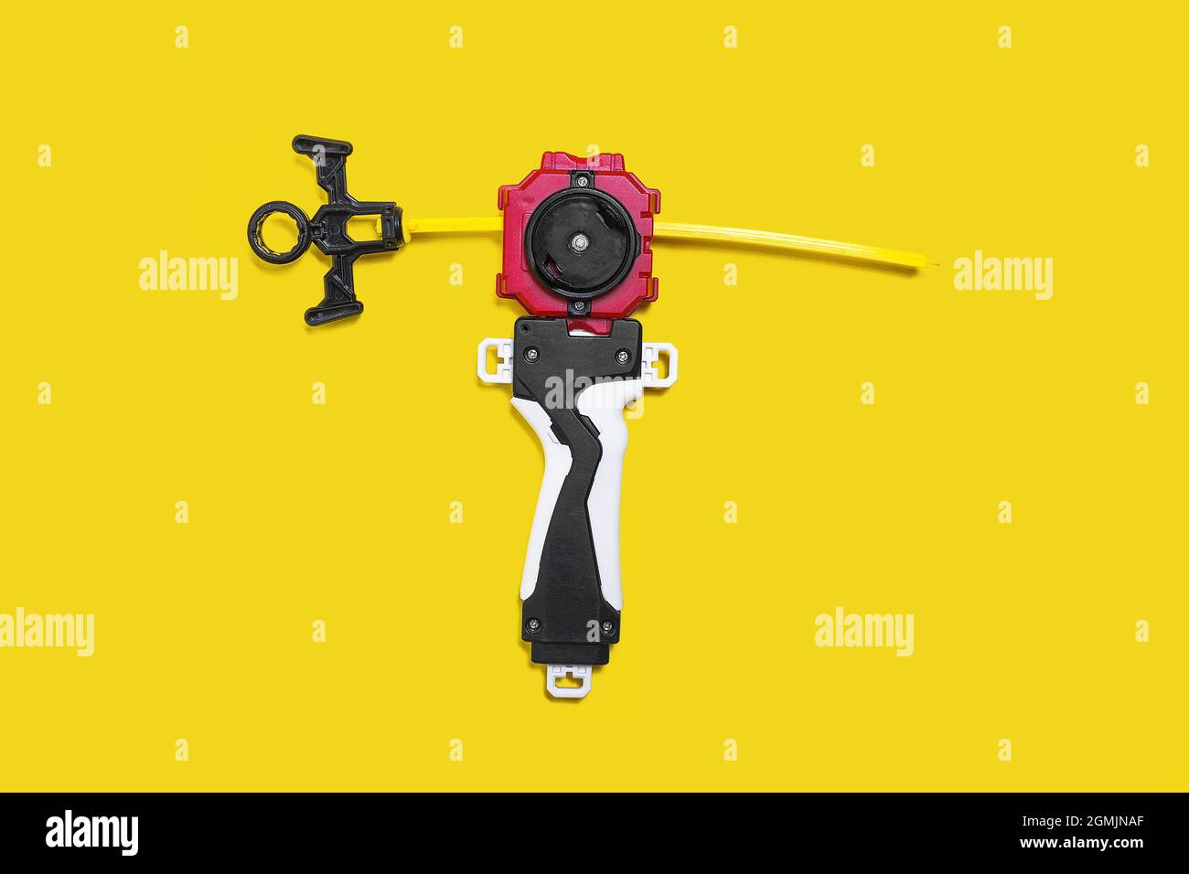 blade kid popular toys on the yellow background Stock Photo - Alamy