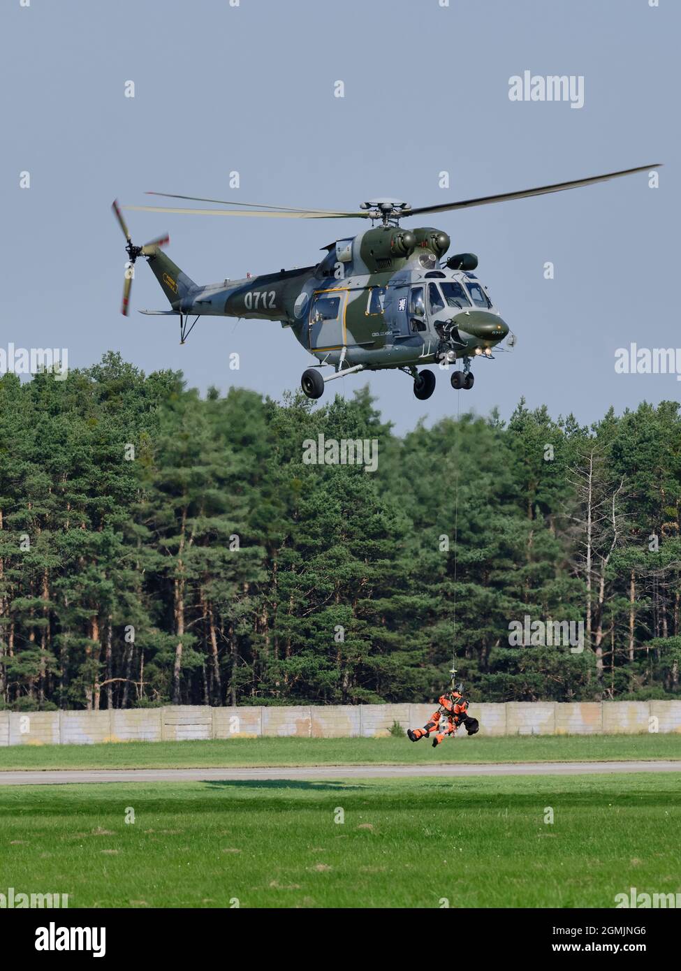 Rescue helicopter in action Stock Photo - Alamy