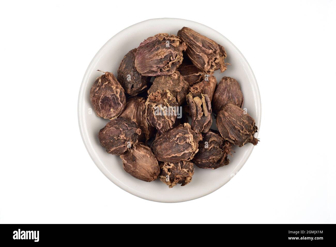 Black Cardamom in Bowl Isolated on White Background with clipping Path ...