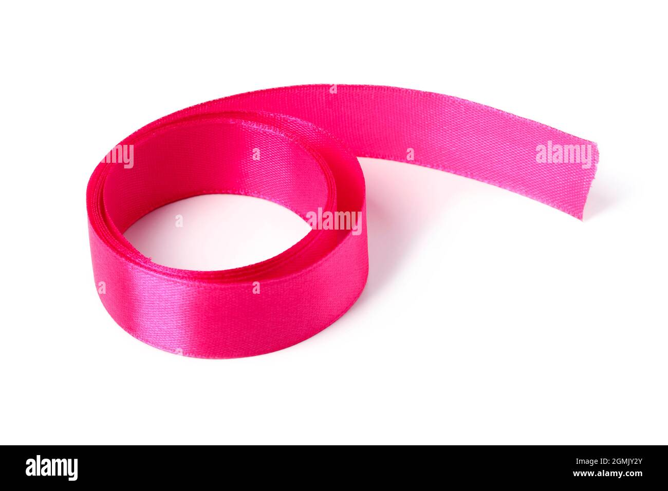 Pink silk ribbon wound in roll isolated on white Stock Photo - Alamy