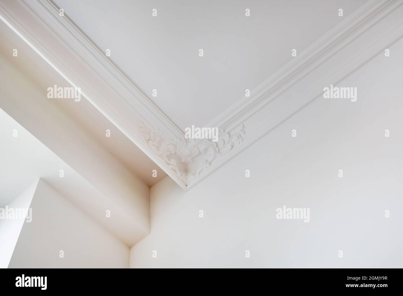 corner of ceiling and walls with intricate crown moulding. Interior ...
