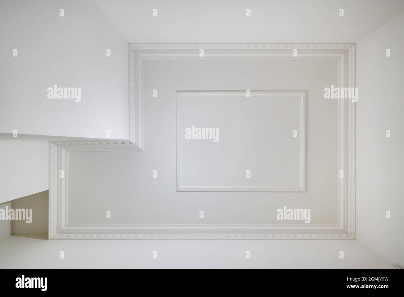 corner of ceiling and walls with intricate crown moulding. Interior ...