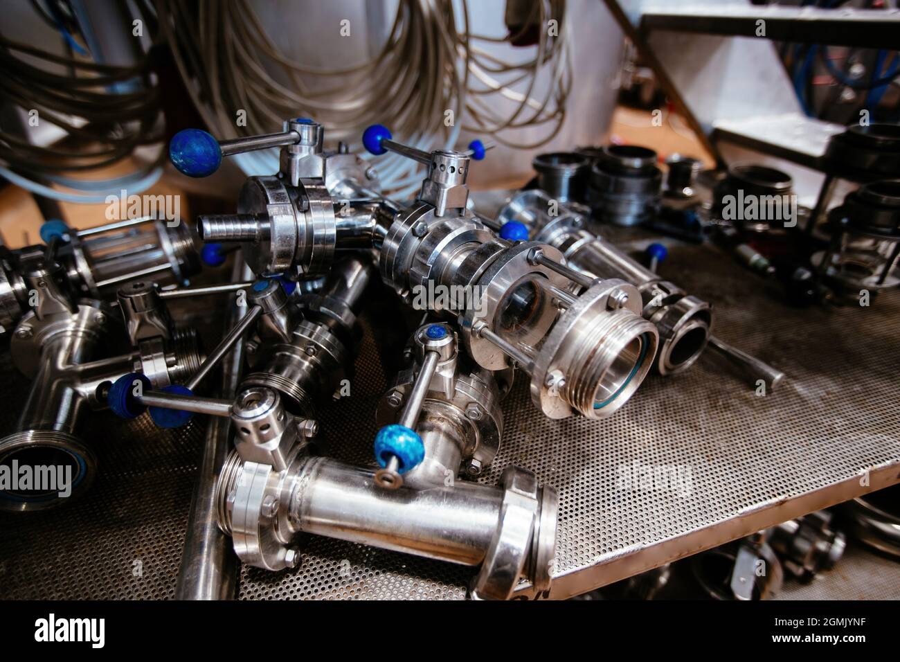 Stainless steel pipe connectors with valves on the table Stock Photo ...