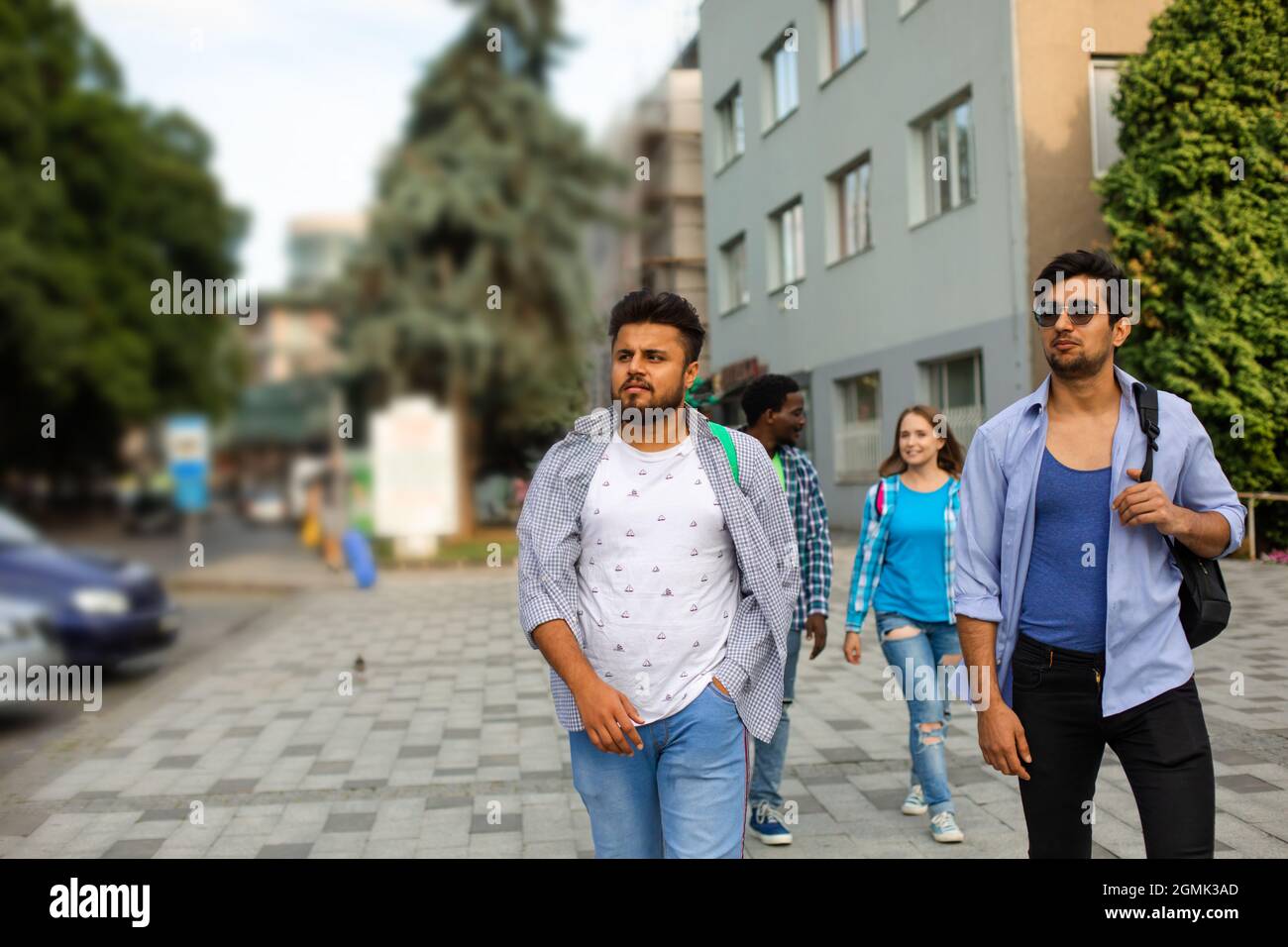 Two boys talking street hi-res stock photography and images - Alamy