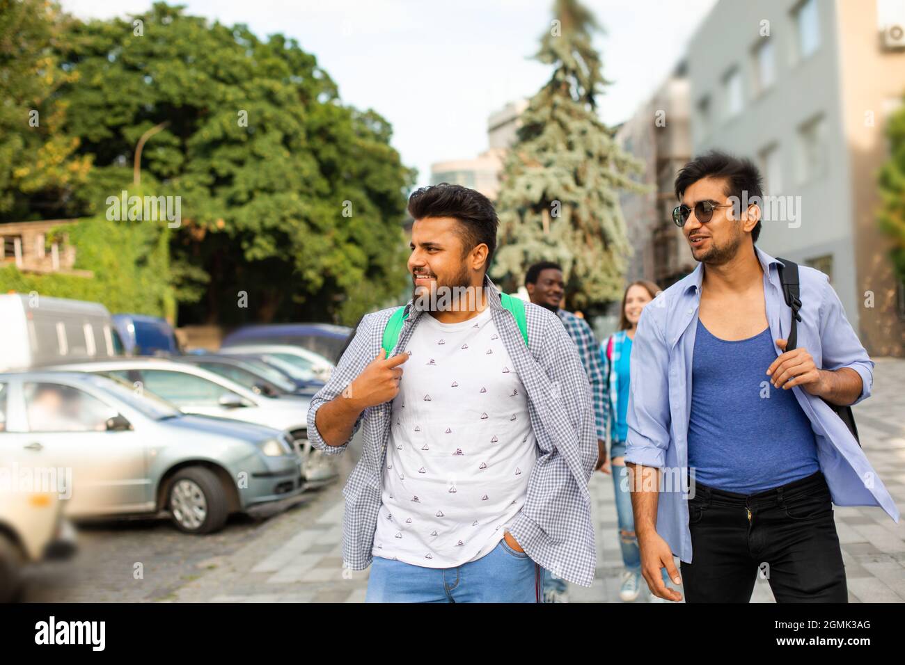 Two boys talking street hi-res stock photography and images - Alamy