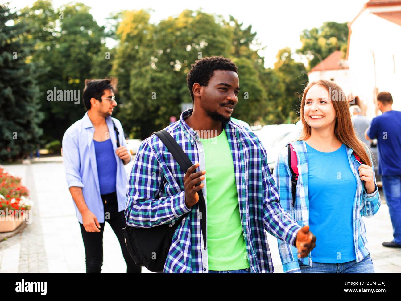 Two boys talking street hi-res stock photography and images - Alamy