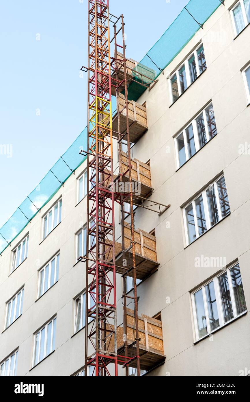 Construction freight elevator attached to the renovated european ...