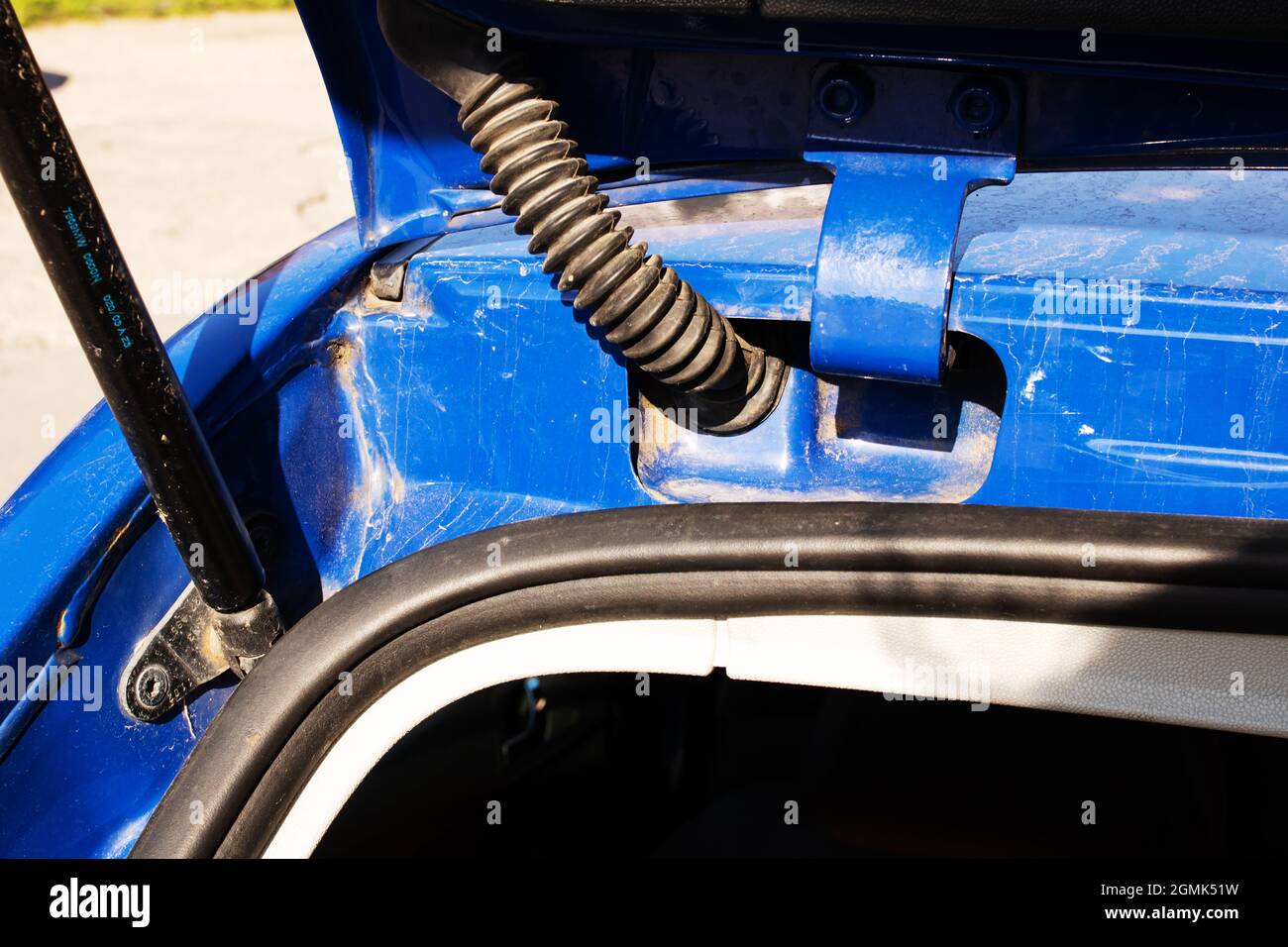 Blue car tailgate system close up, mechanical part Stock Photo - Alamy