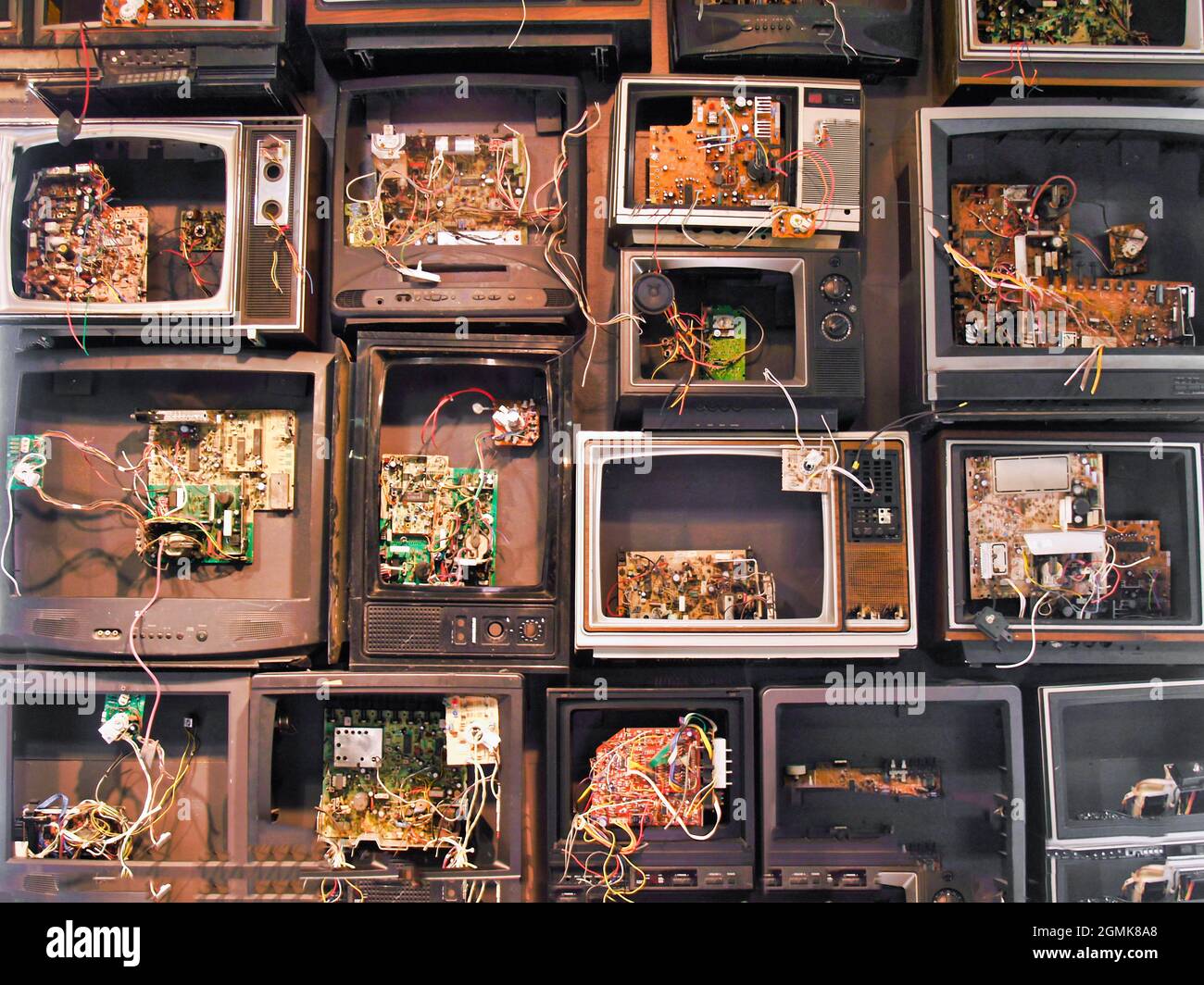 The stacks of broken old TV and pinball machines Stock Photo - Alamy