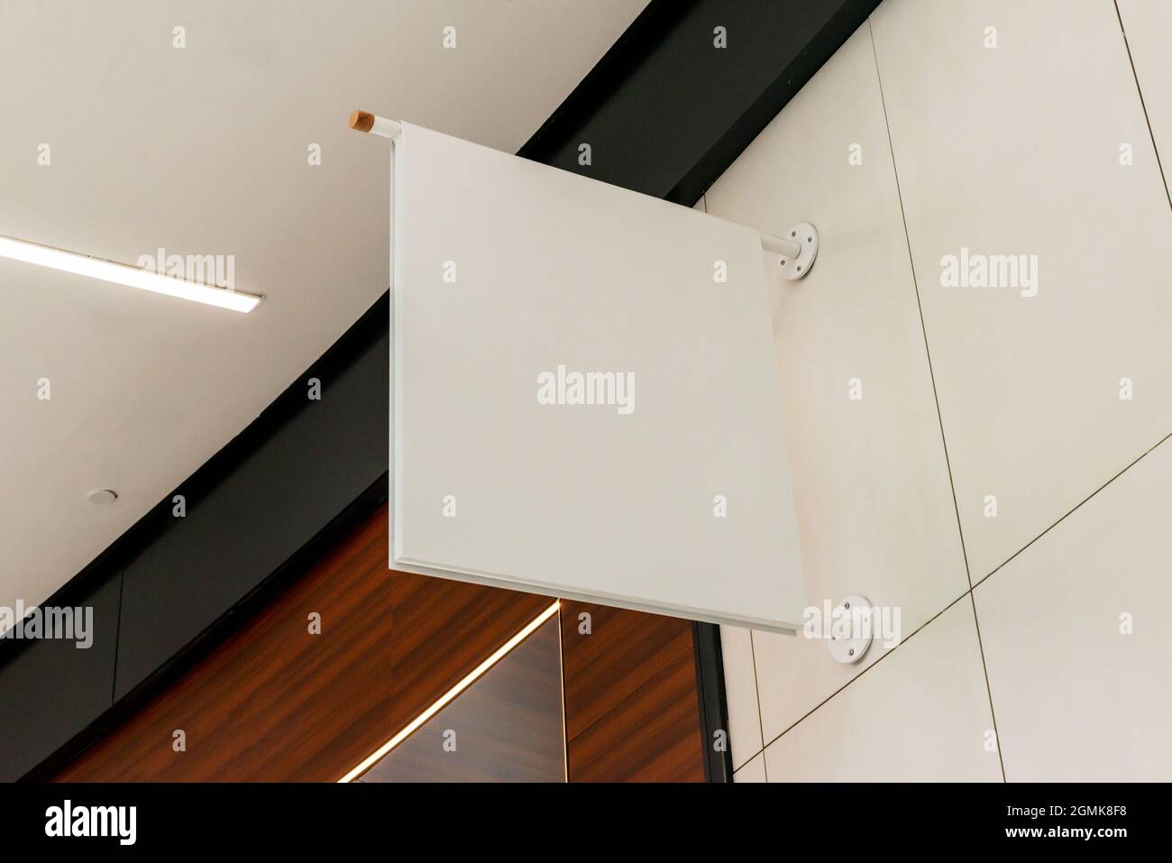 Blank Shop Sign Board In Shopping Mall For Logo Promotion Stock Photo blank-shop-sign-board-in-shopping-mall-for-logo-promotion-stock-photo