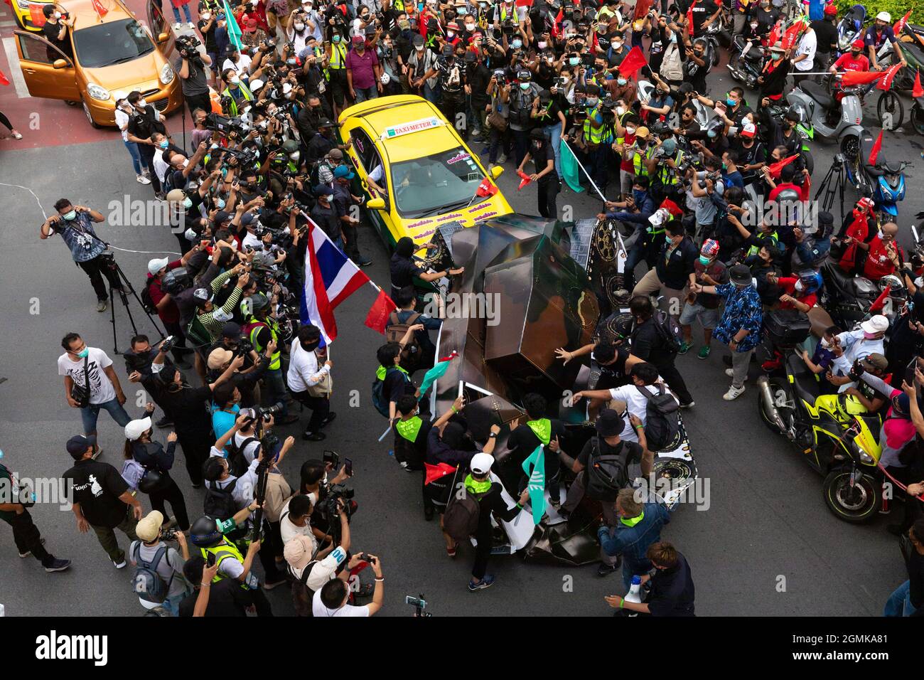 Protesters seen destroying replica of tank during the demonstration.Red ...