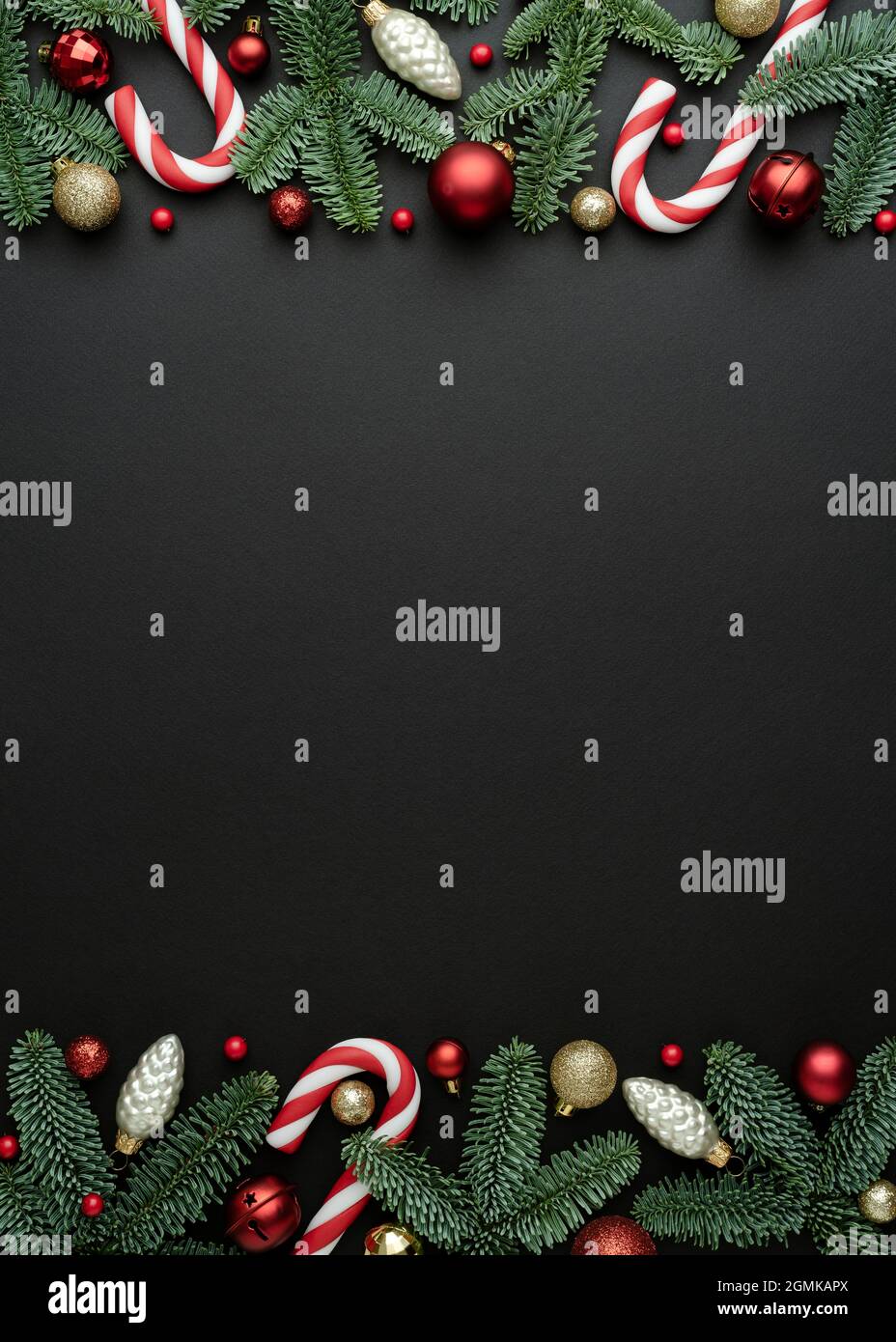 Frame of Christmas tree ornaments on a black background. Festive design ...