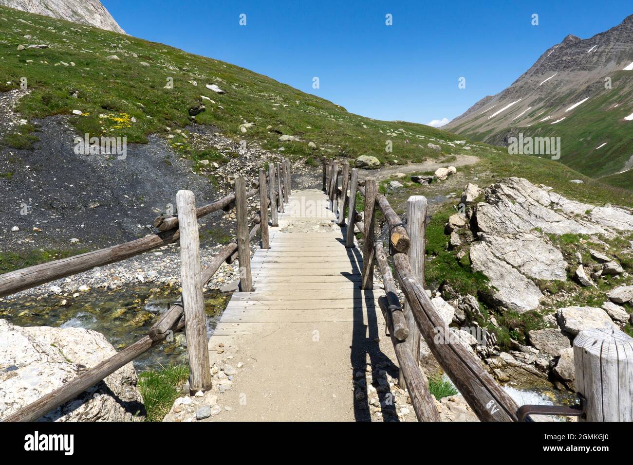 Simple wooden planks as bridge construction in the mountain area Stock ...