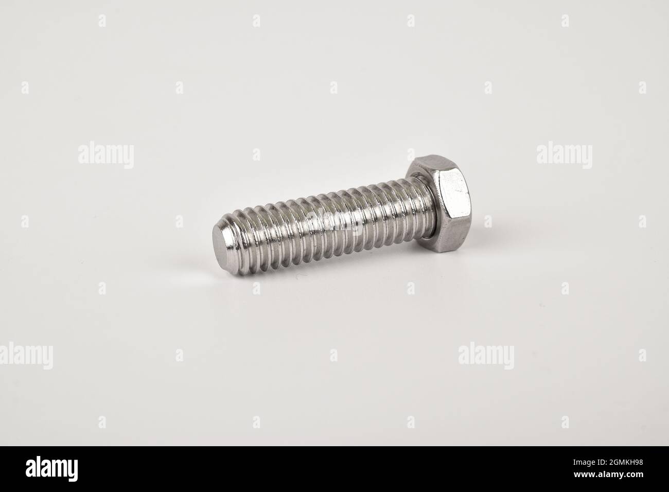 single bolt on white background, close up Stock Photo - Alamy