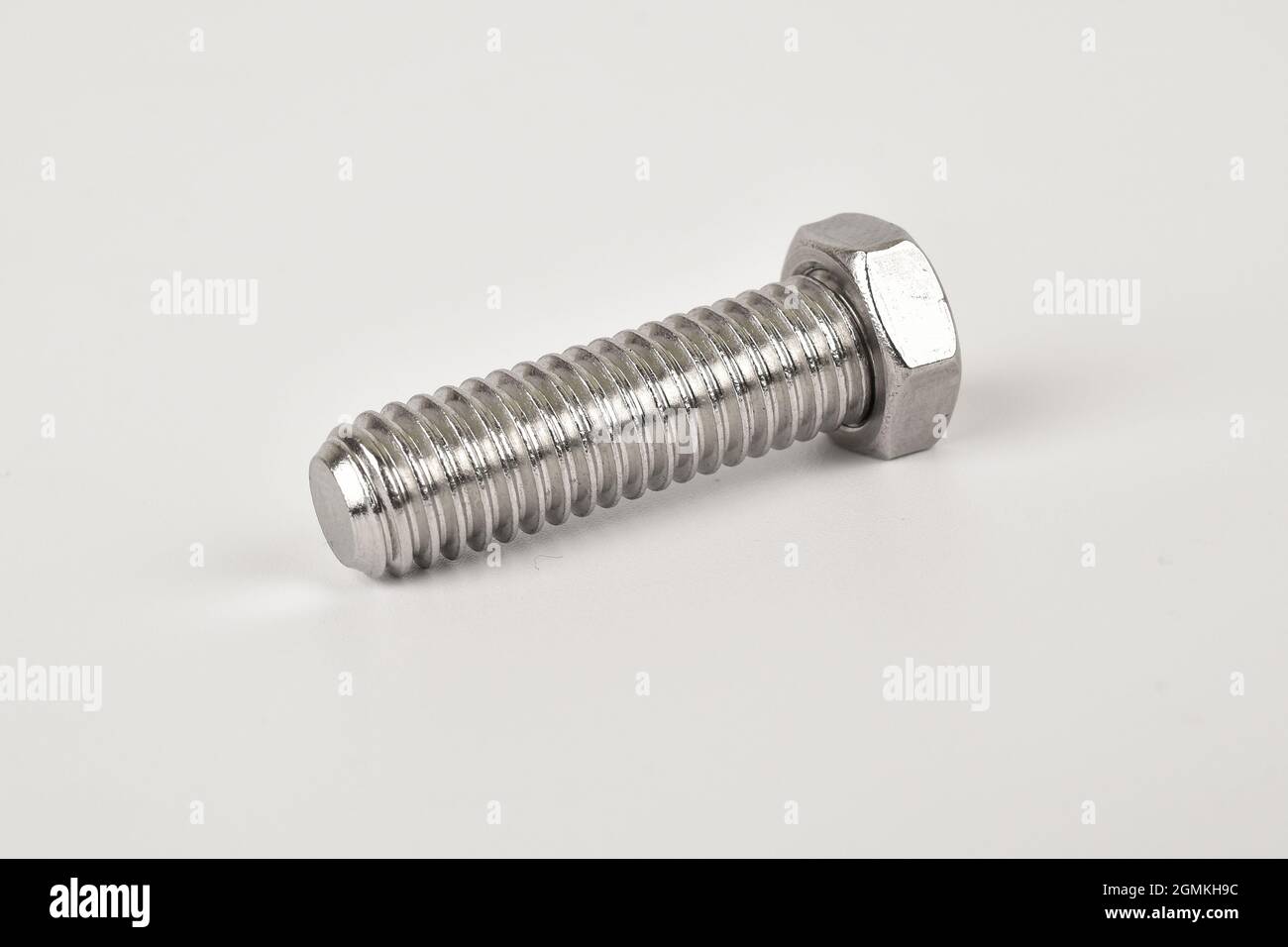 single bolt on white background, close up Stock Photo - Alamy
