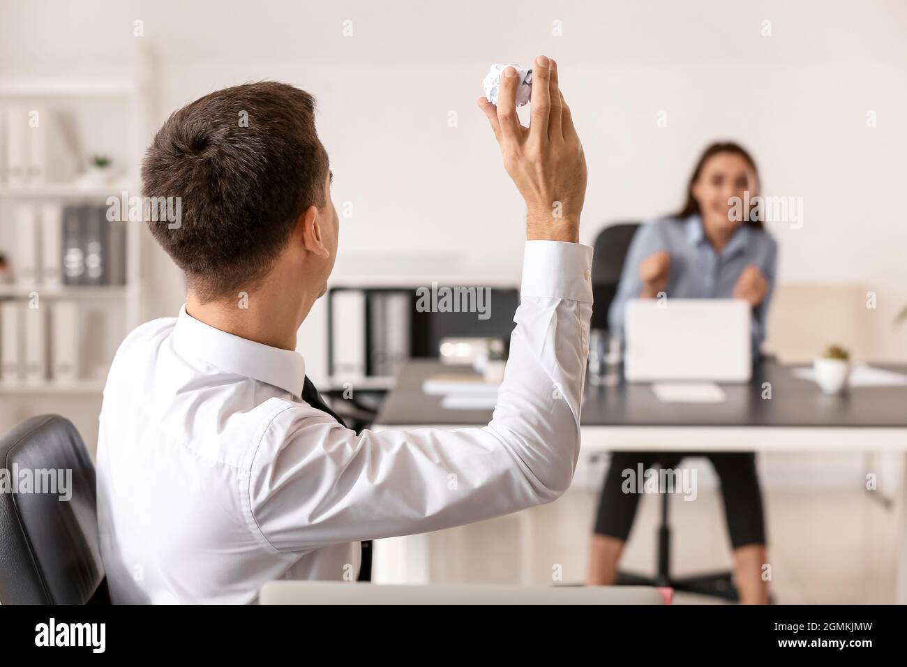Happy colleagues having fun in office Stock Photo - Alamy