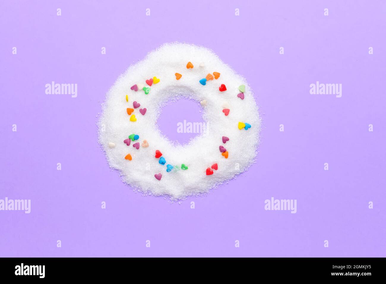 Doughnut made of sugar on color background Stock Photo - Alamy