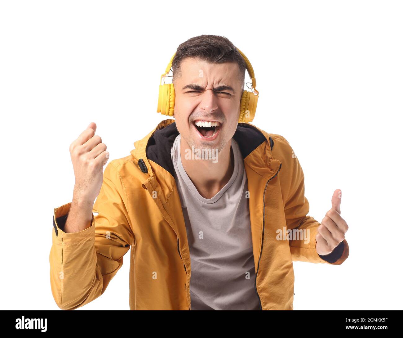Handsome brunette man listening hi-res stock photography and images - Alamy